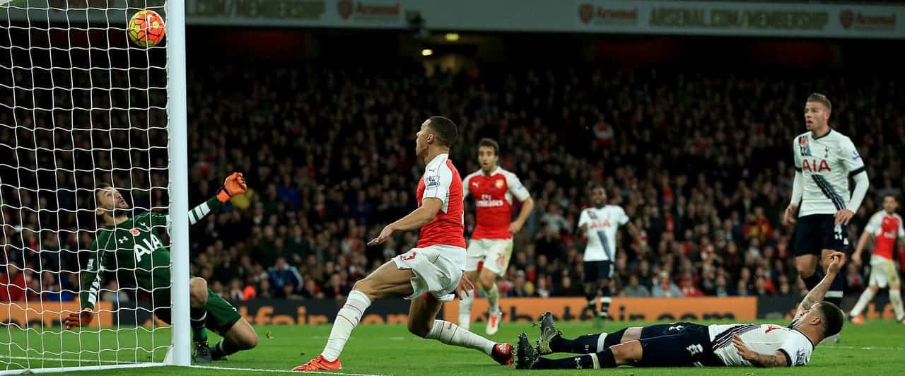 Gibbs comes to Gunners rescue in north London derby